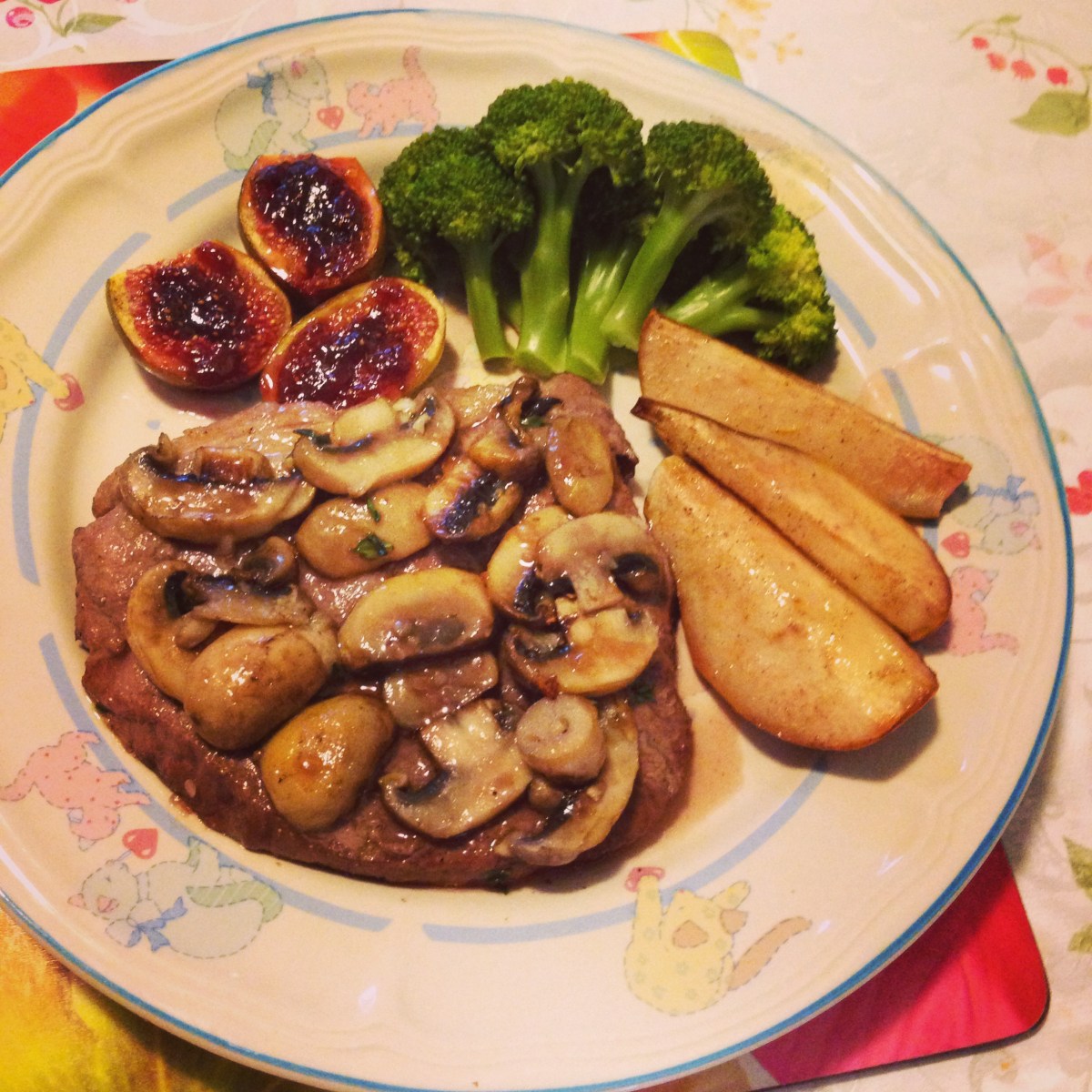 Rump steak with mushroom sauce, broccoli, poached whiskey pears & baked ...