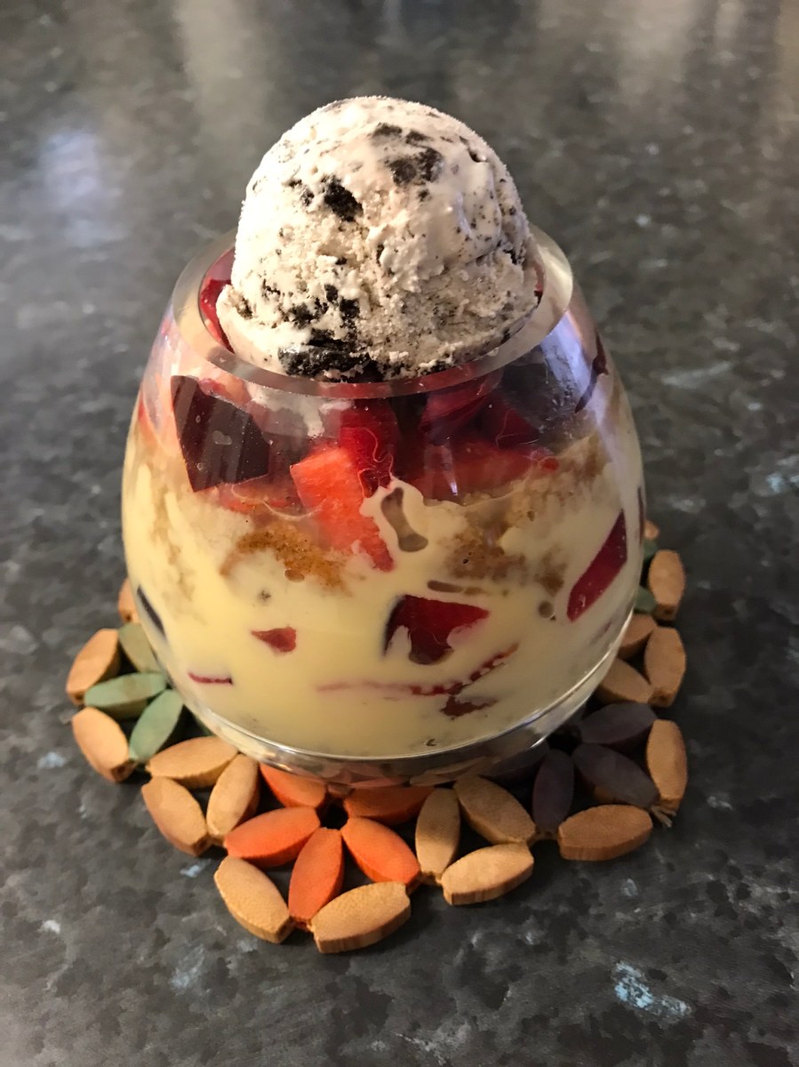 Plum olive oil cake pudding with plums strawberries and ice cream ...