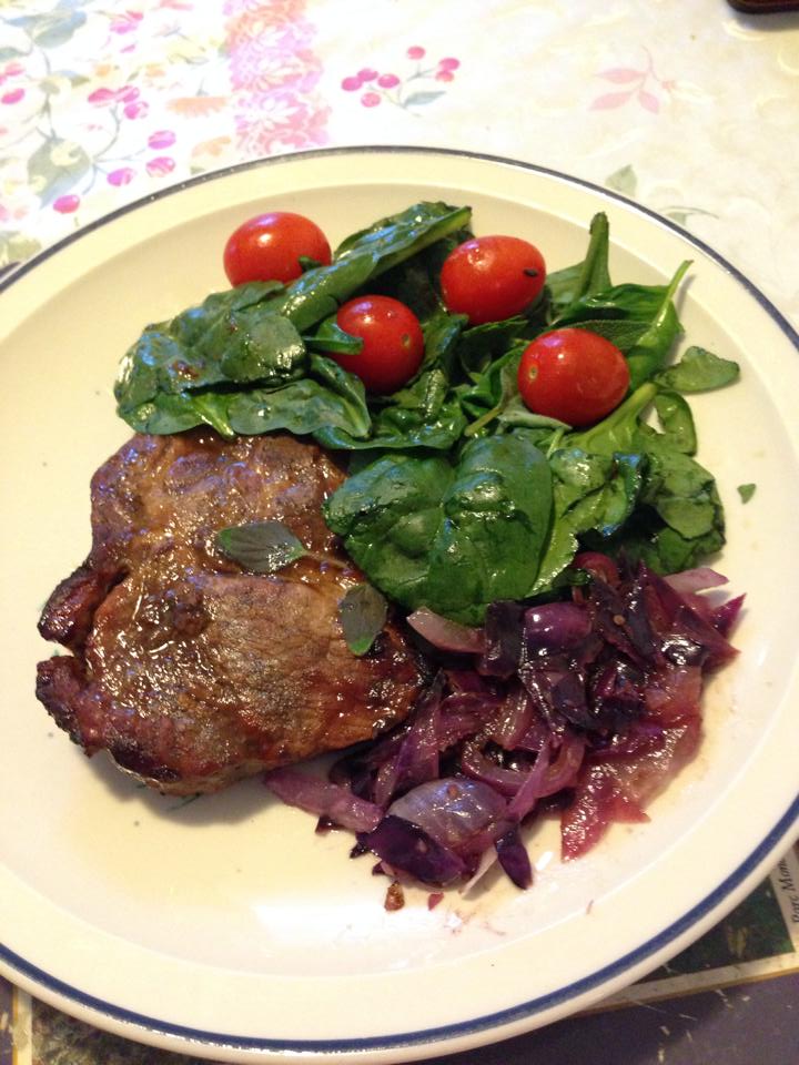 Orange & balsamic vinegar steak serve with fresh spinach tomato ...