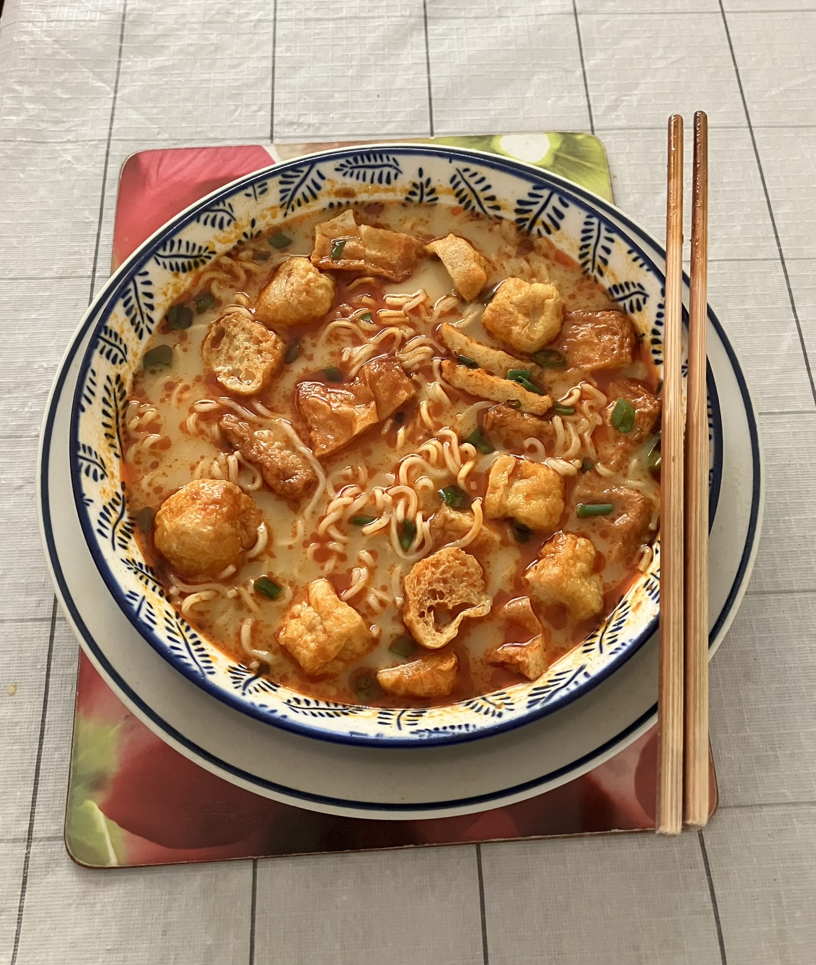 White Penang curry mee with tofu pok fish cakes pork balls and spring ...