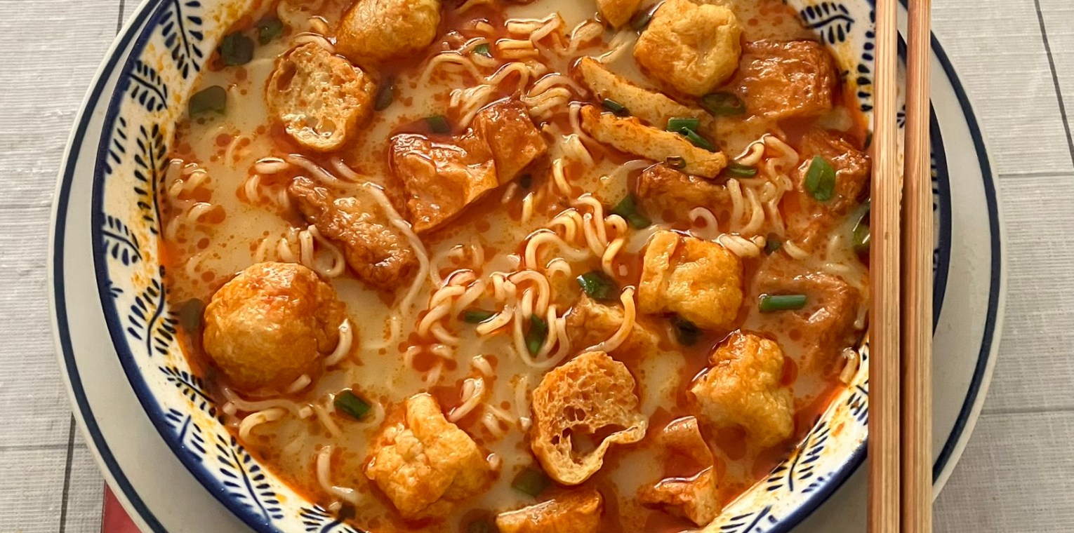 White Penang curry mee with tofu pok fish cakes pork balls and spring ...